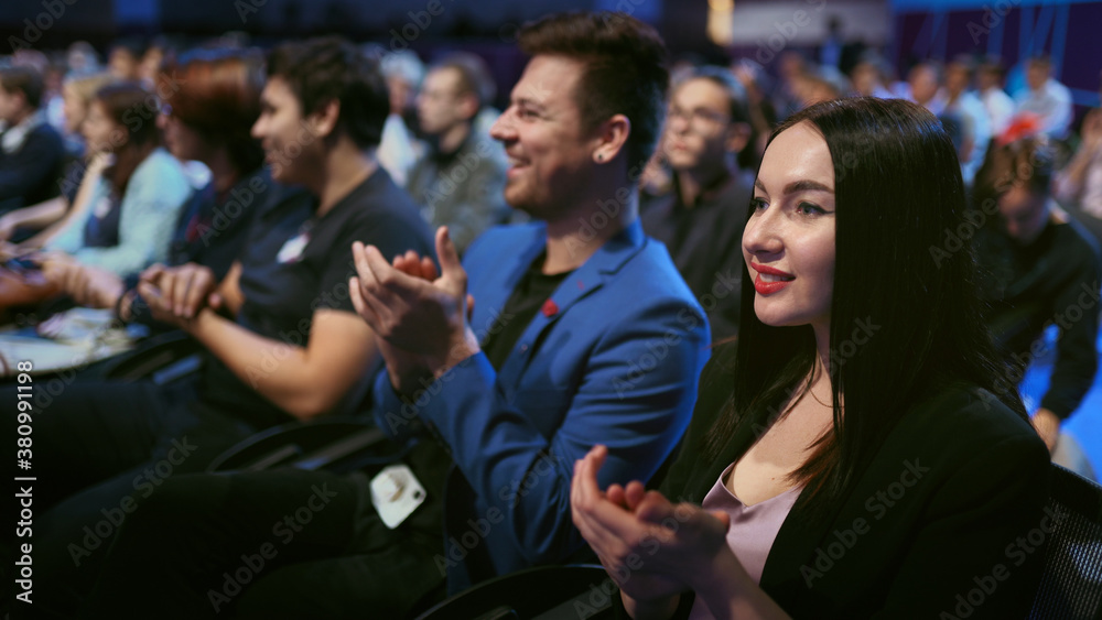 Seminar business meeting applause speaker. Crowd smiling audience ...