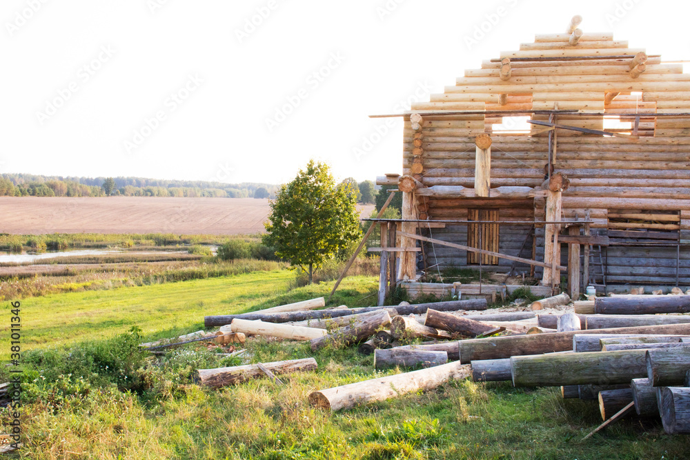 Timber house. The eco-friendly house is made of wooden bars. The ...