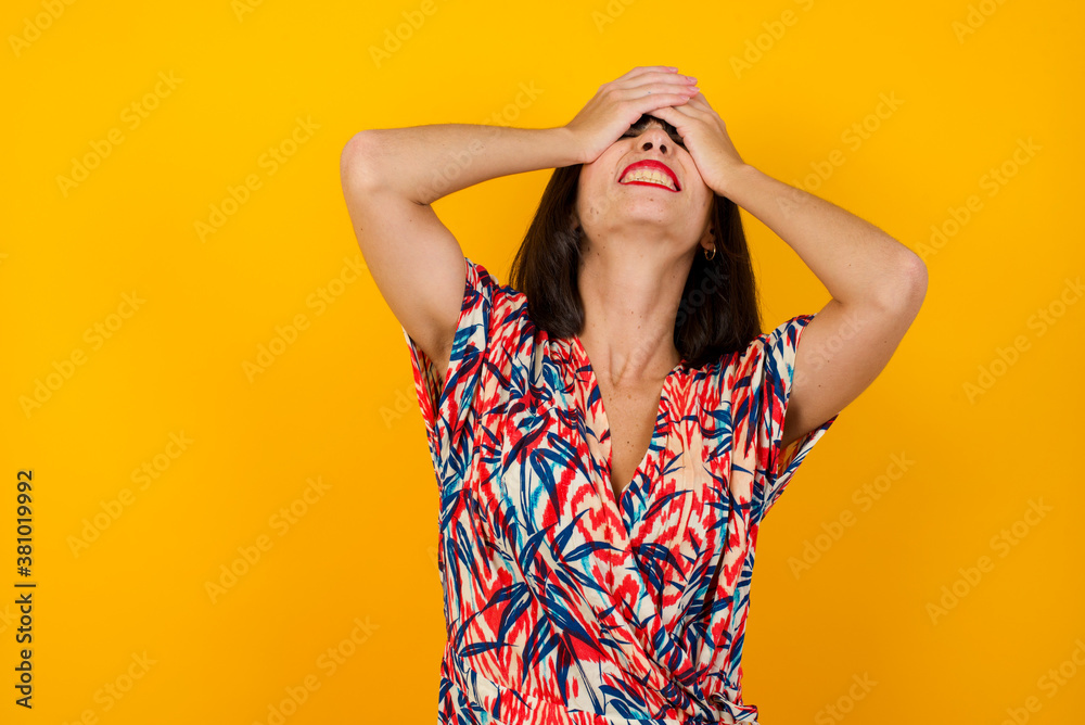 Shocked panic Caucasian girl dressed in stylish clothing holding hands ...