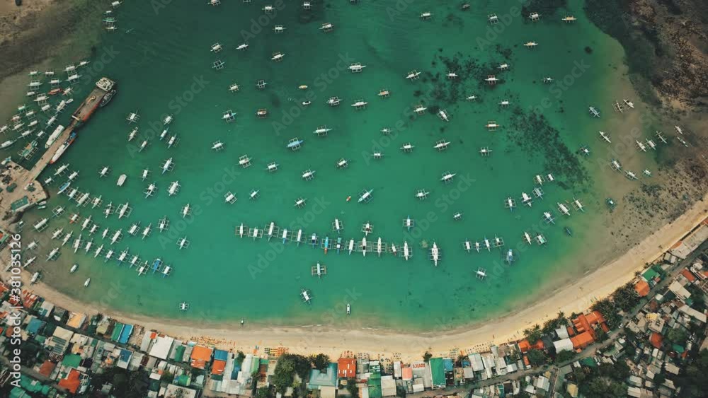 Aerial tropical pier town with boats, ships at ocean bay view ...