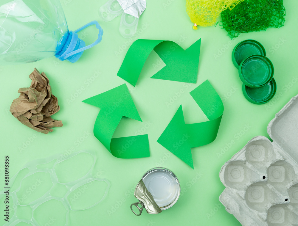 Green recycling logo with objects to recycle. Recycling concept. Stock ...