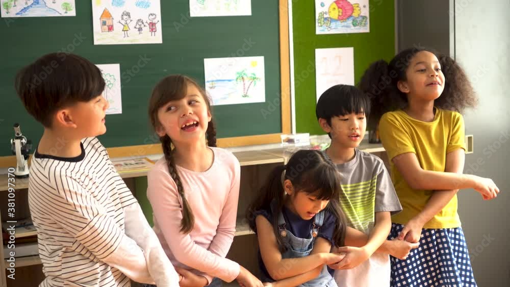 Cheerful school friends with arms around each other, happiness ...