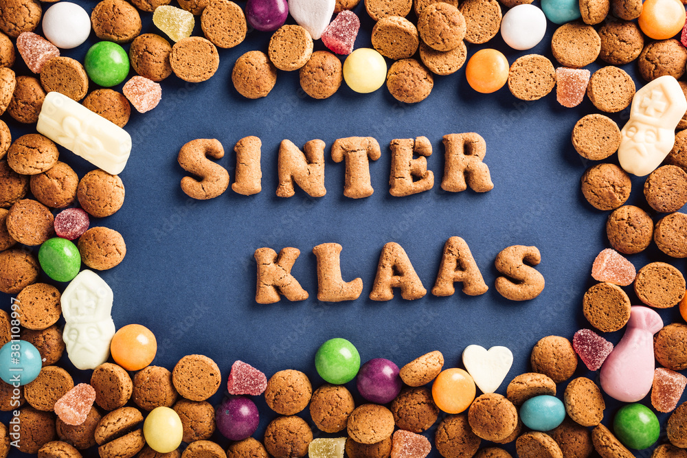 Dutch holiday Sinterklaas background with kruidnoten cookies and ...