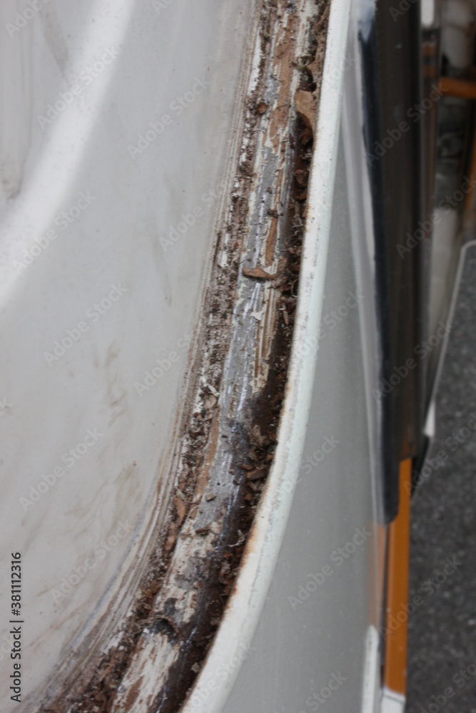 restoration of rain gutter on oldtimer camper van, old car, working on ...