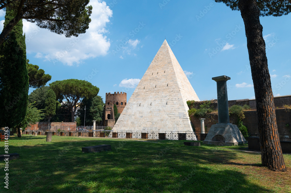 The Piramide Cestia or Pyramid of Cestius seen from the park of the non ...