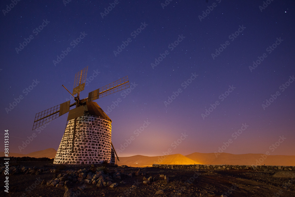 Old flour mill with a very colorful sunset background Stock-Foto ...