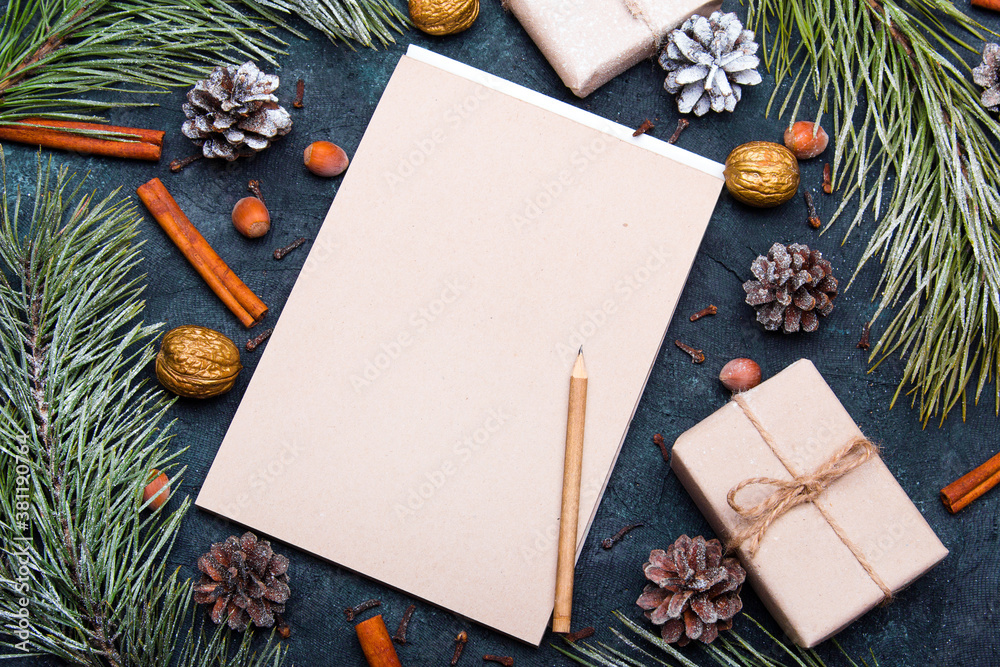 Christmas background with blank notebook surrounded by Christmas ...