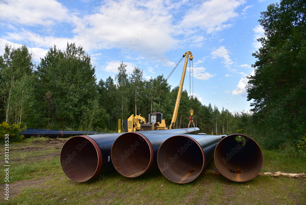 Natural gas pipeline construction work in forest area. Installation of ...