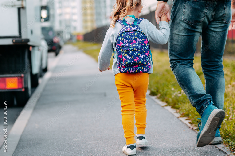 Father and daughter going to school for the first time. Back to school ...