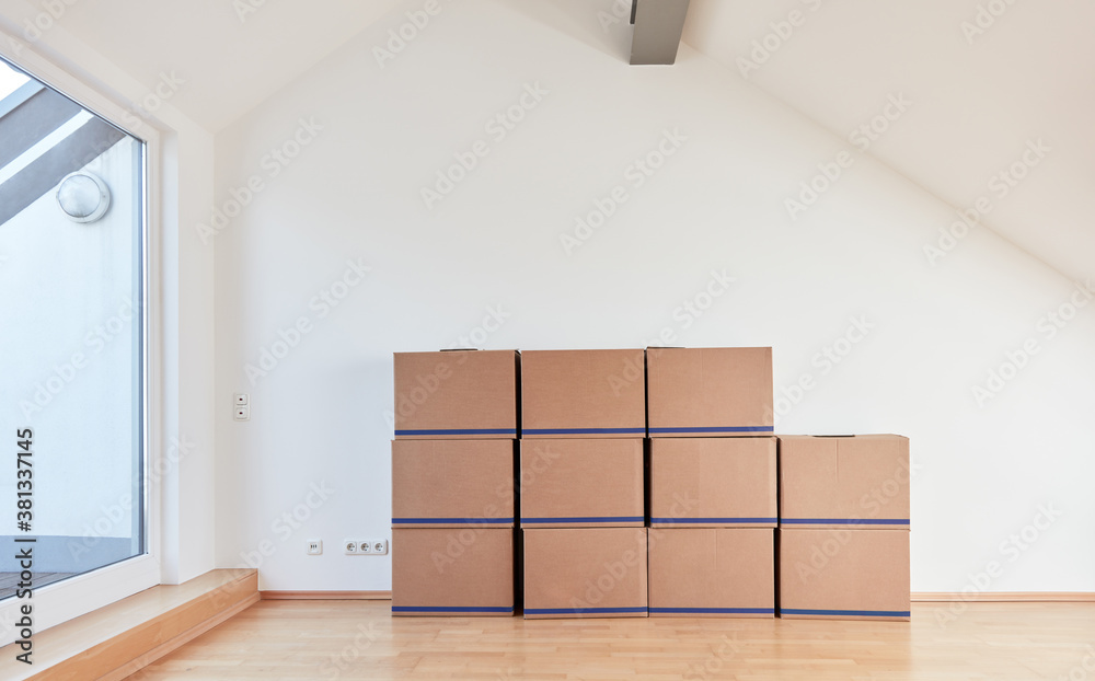 Moving boxes in the attic after moving to a new apartment Stock Photo ...
