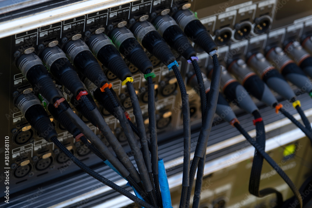 Audio snake and stage box with xlr cables and jacks at a live show ...