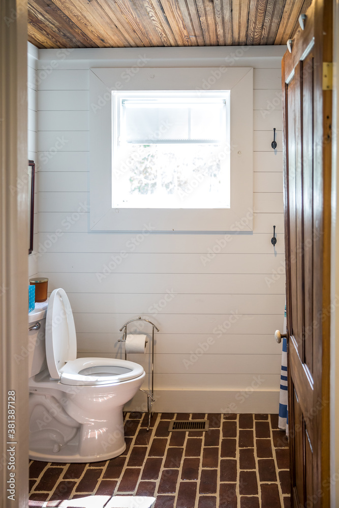 Small and compact bathroom shower stall in a small farmhouse decor ...