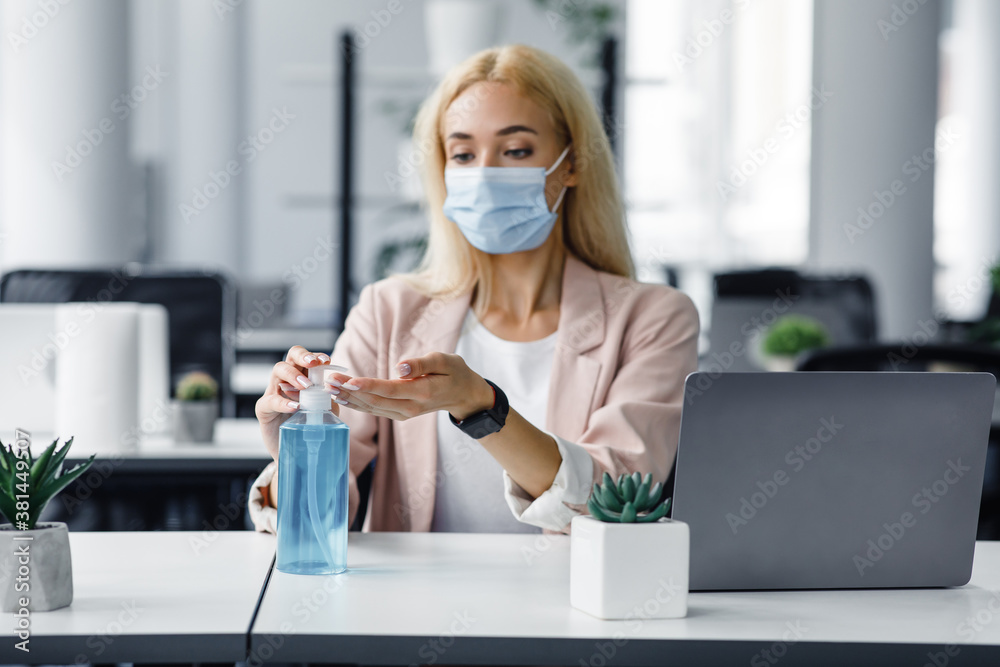 Safety and health protection at work in office. Millennial woman in ...