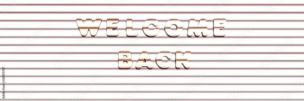 Inscription WELCOME BACK of wooden letters. White background with ...