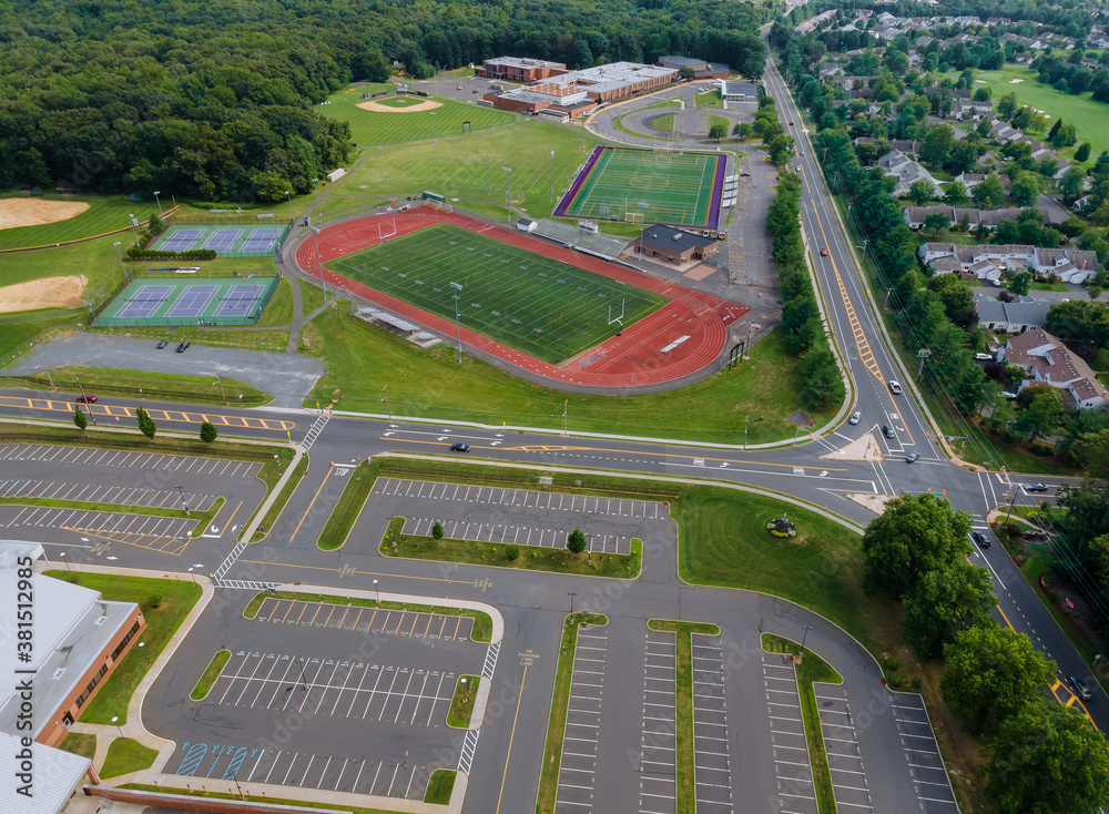 Aerial view of empty stadium with basketball field and training ground ...