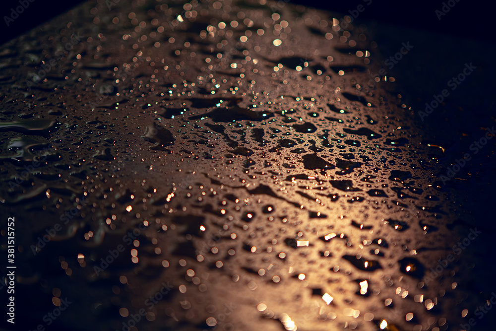 Photo & Art Print Rain drops on the illuminated surface . Night pluvial ...