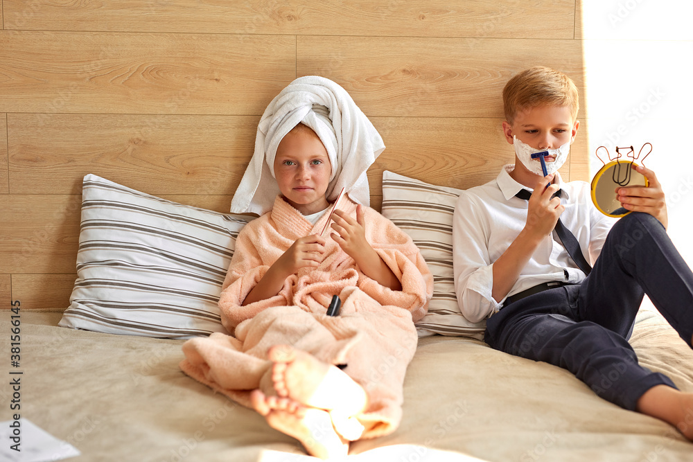 adorable kids couple have happy morning, take care of themselves, boy ...