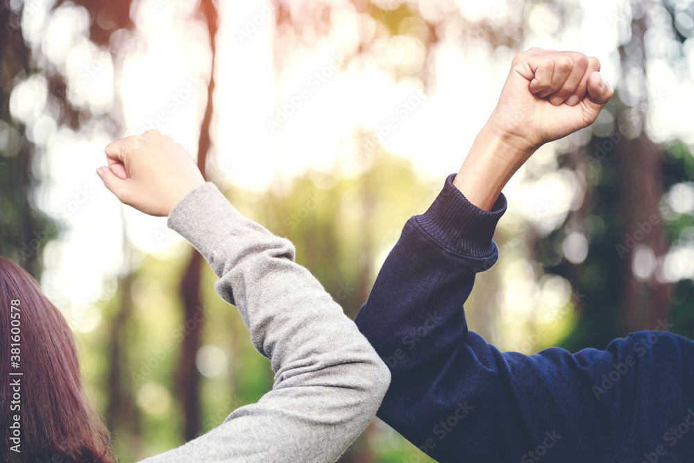 Two people Elbow bump. New normal novel greeting to avoid the spread of ...