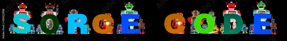 retro tin robot toys hold up the word SORCE CODE isolated black Stock ...