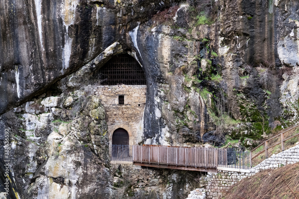Predjama Castle, situated in the middle of a cliff near Postojna Cave ...