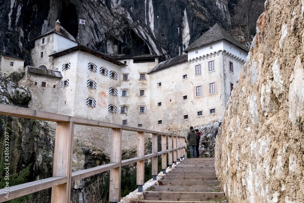 Predjama Castle, situated in the middle of a cliff near Postojna Cave ...
