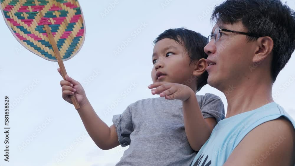 4K Asian child boy and dad in happy moment shot, smiling and laughing ...