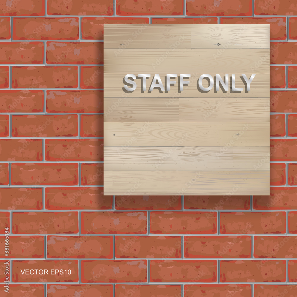 "Staff only" text on background of wood board texture and red brick ...
