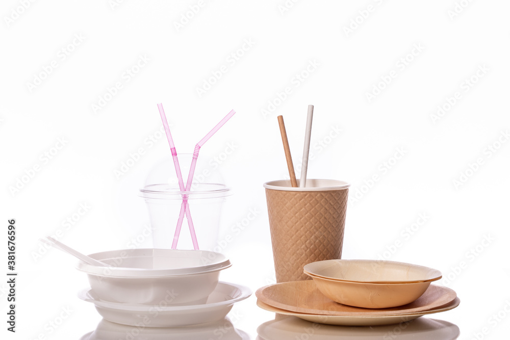 Contrast plastic and biodegradable disposable tableware isolated on ...