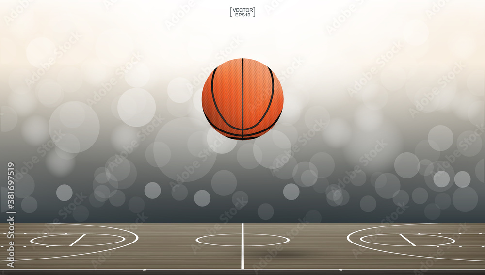 Basketball ball on basketball court area with light blurred bokeh ...