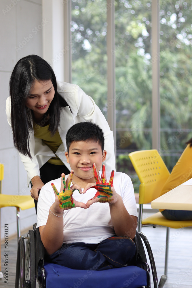 Disabled kids classroom, children having fun during study at school ...