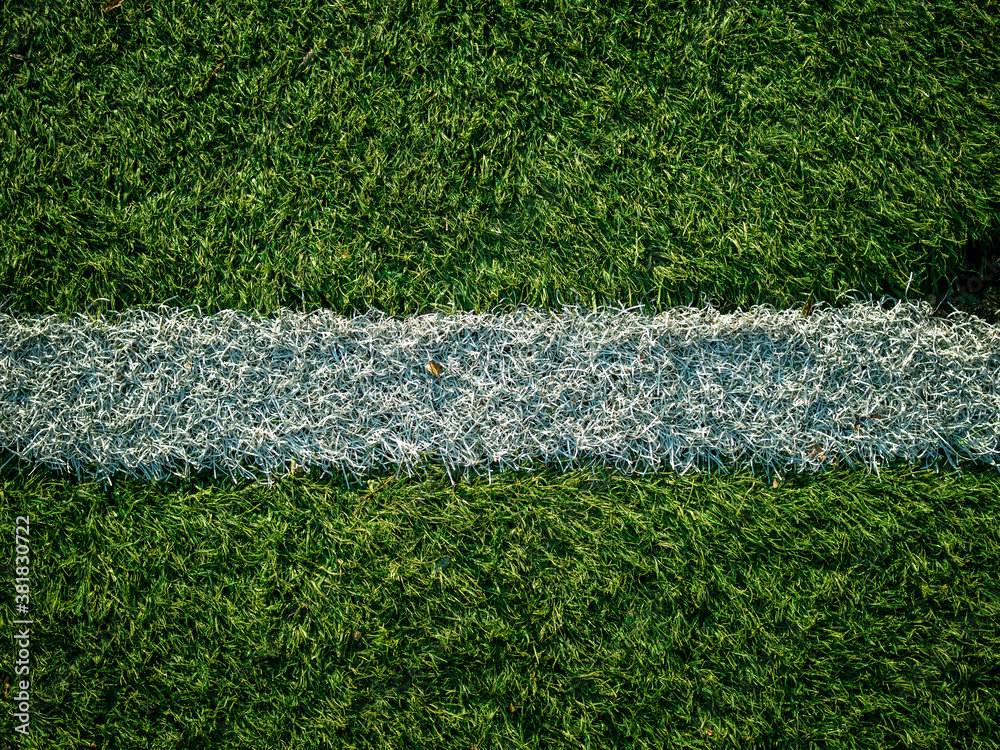 Close up image of white field lines of the penalty area on a football ...