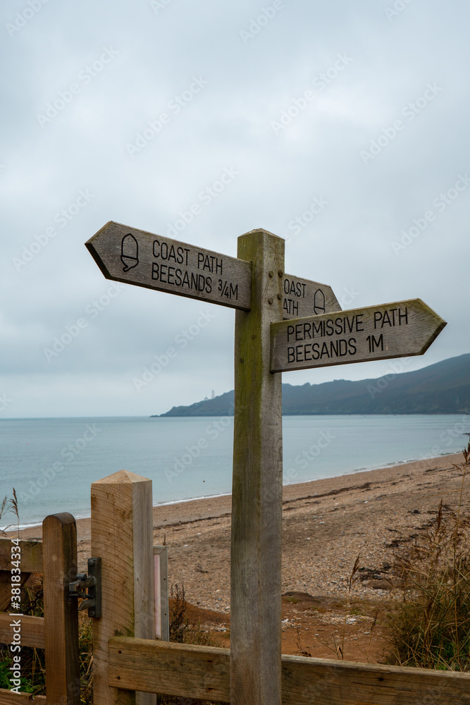 Portrait view of sign post on the Devon coastal path popular with ...