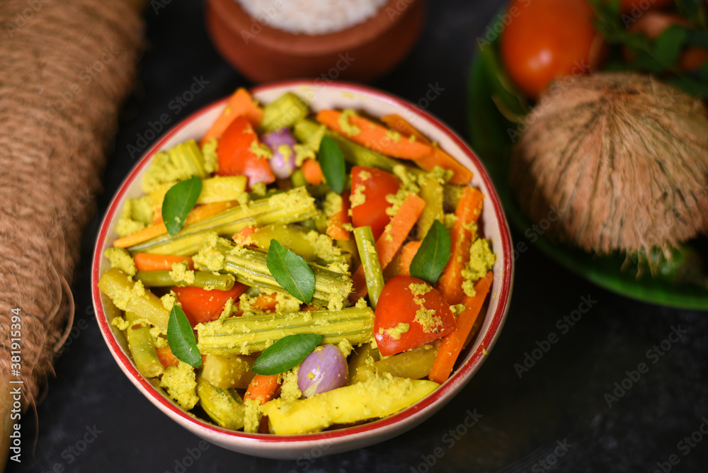 Aviyal and rice Kerala mixed vegetable curry with grated coconut on ...