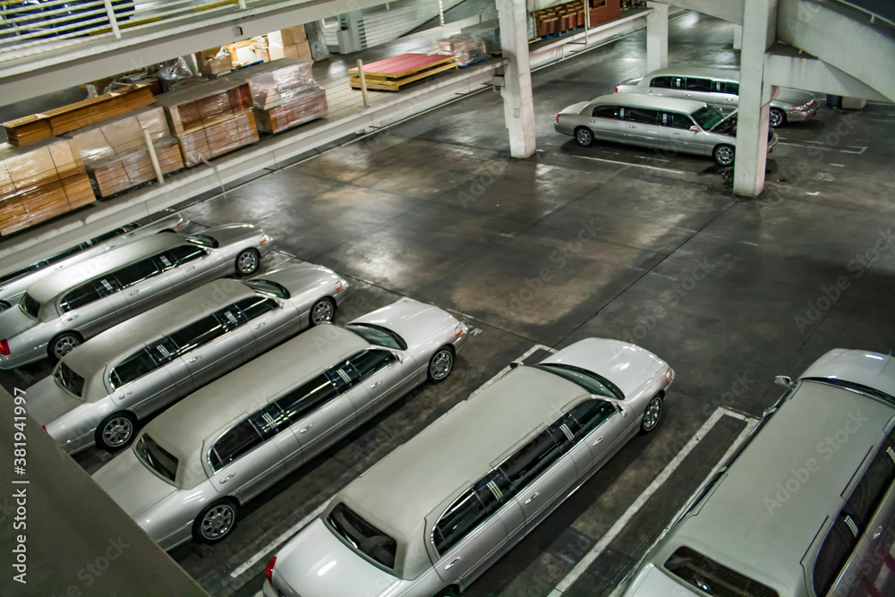 the strech limousines are parked in a garage and are ready to transport ...