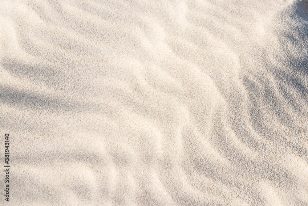 Sand background. Shadows and patterns on the sand of dune. Sandy beach ...