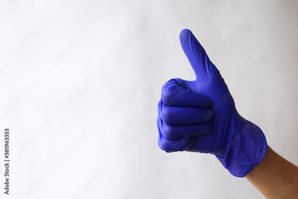 Hands in blue surgical gloves. Like sign icon made from green medical ...