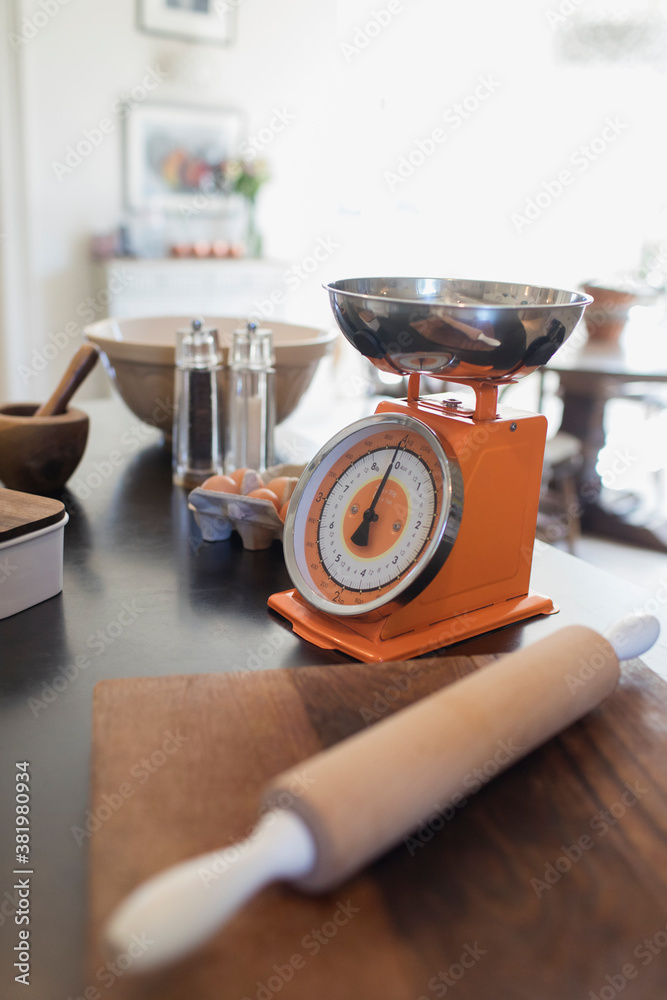 Baking scale and equipment on kitchen counter Stock Photo | Adobe Stock