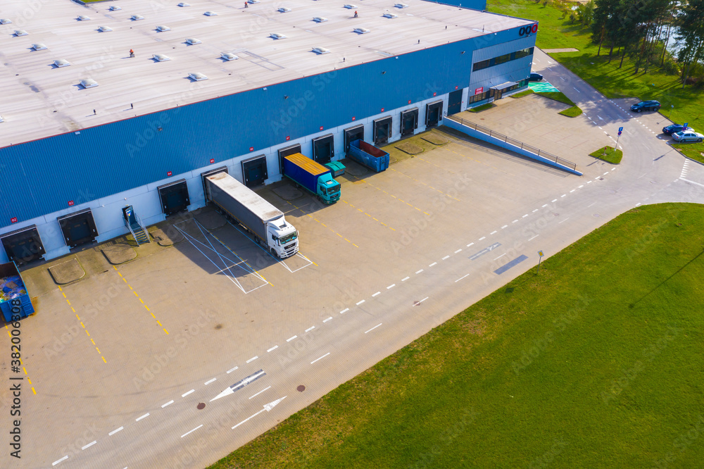 Aerial view of goods warehouse. Logistics center in industrial city ...