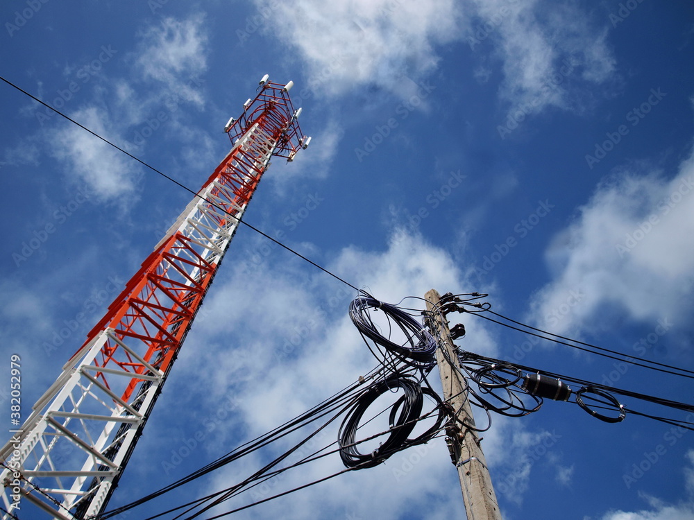 Power lines on concrete poles and telecommunication towers. Power ...