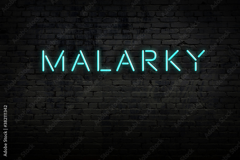 Neon sign. Word malarky against brick wall. Night view Stock ...