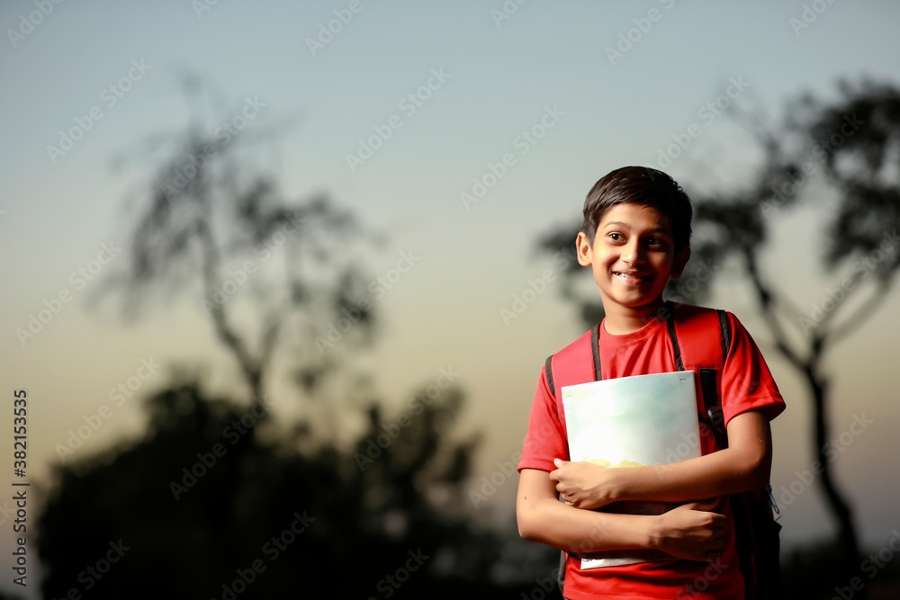 Cute little Indian / Asian school boy with note book and bag Stock ...