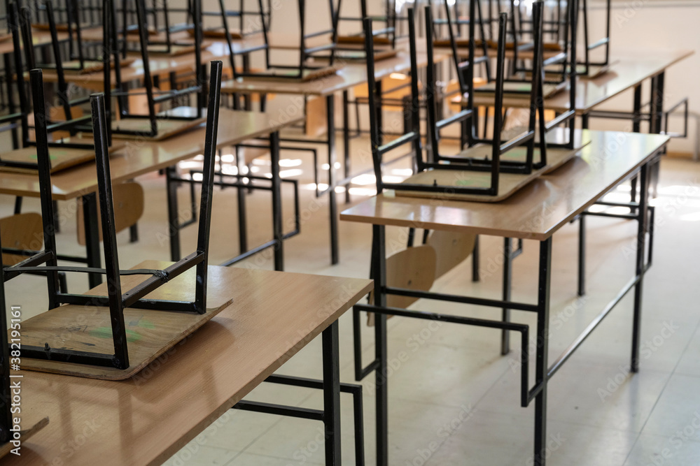 Lecture room or School empty classroom with desks and chair iron wood ...