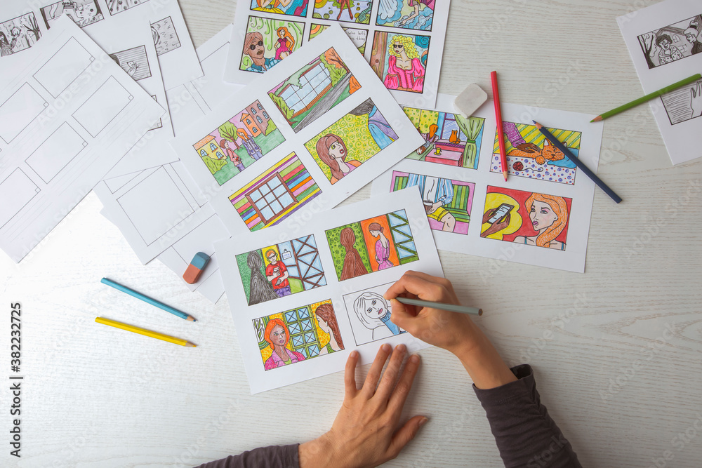 An animator painter draws a color storyboard for a comic book or movie ...