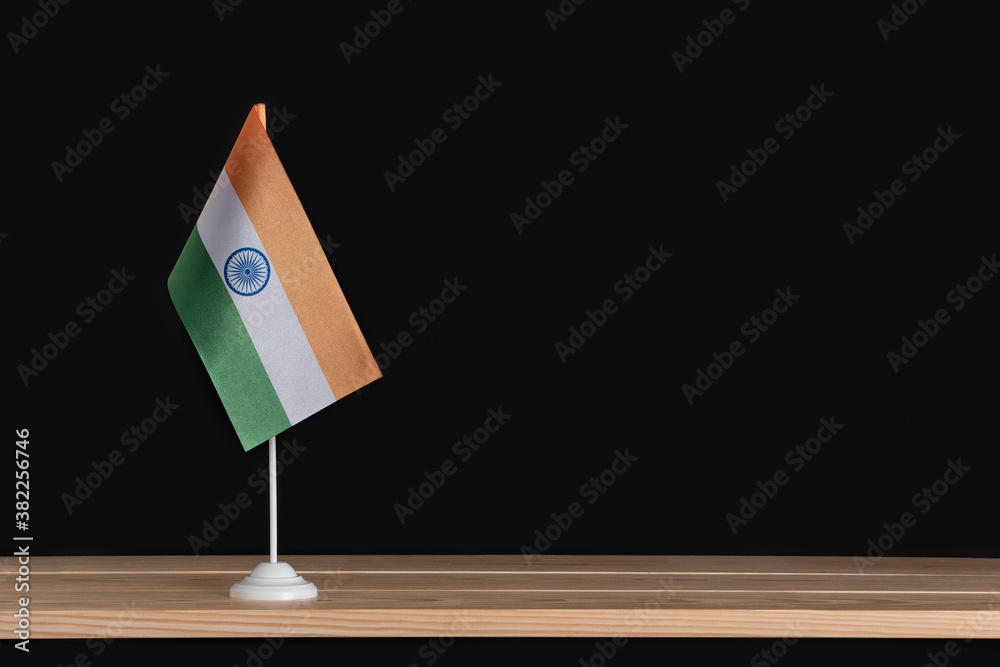 Flag pole. National table flag of India on black background. National ...