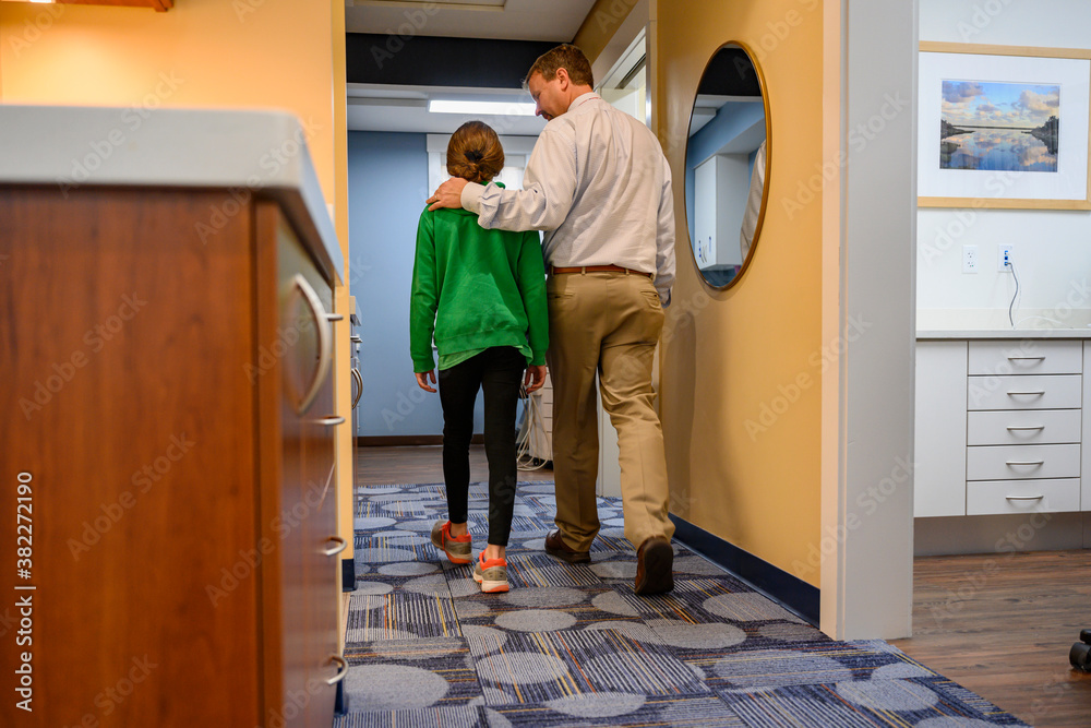 Patient walking with Doctor at Orthodontics Office Stock Photo | Adobe ...