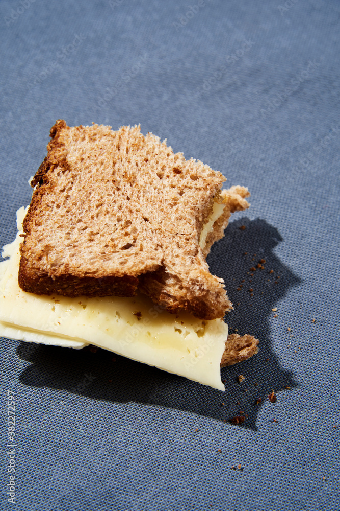 bitten cheese sandwich Stock Photo | Adobe Stock