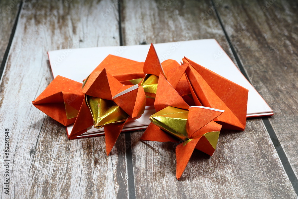 Traditional Chinese golden paper origami using for pay respect in ...