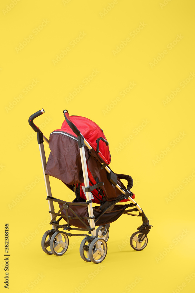 Modern baby stroller on color background Stock Photo | Adobe Stock