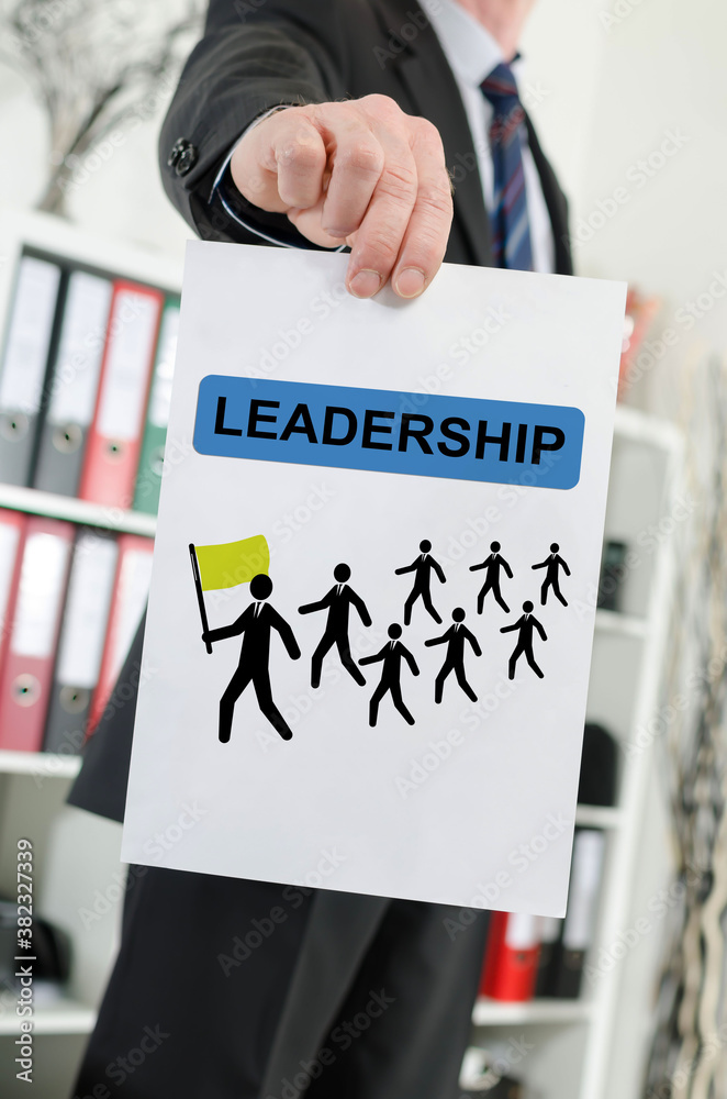 Leadership concept shown by a businessman Stock Photo | Adobe Stock