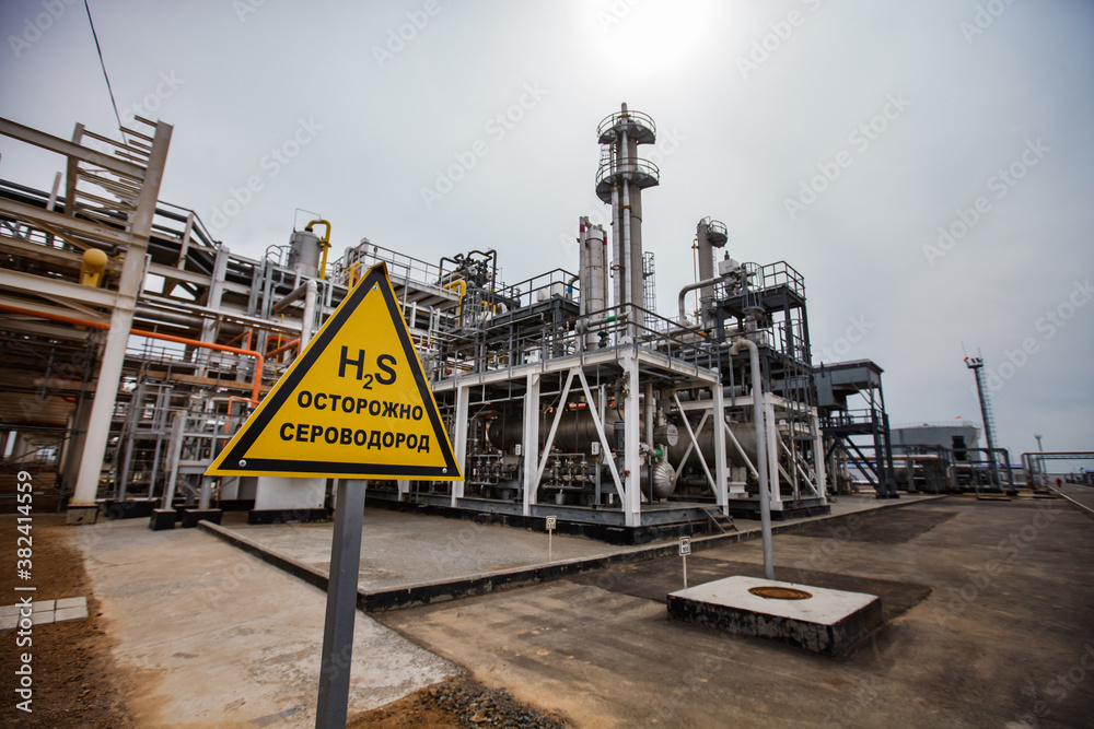 Oil refinery and gas processing plant. Distillation towers and ...